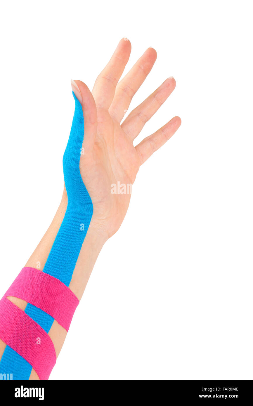 Kinesio tape on female hand isolated on white background. Chronic pain ...