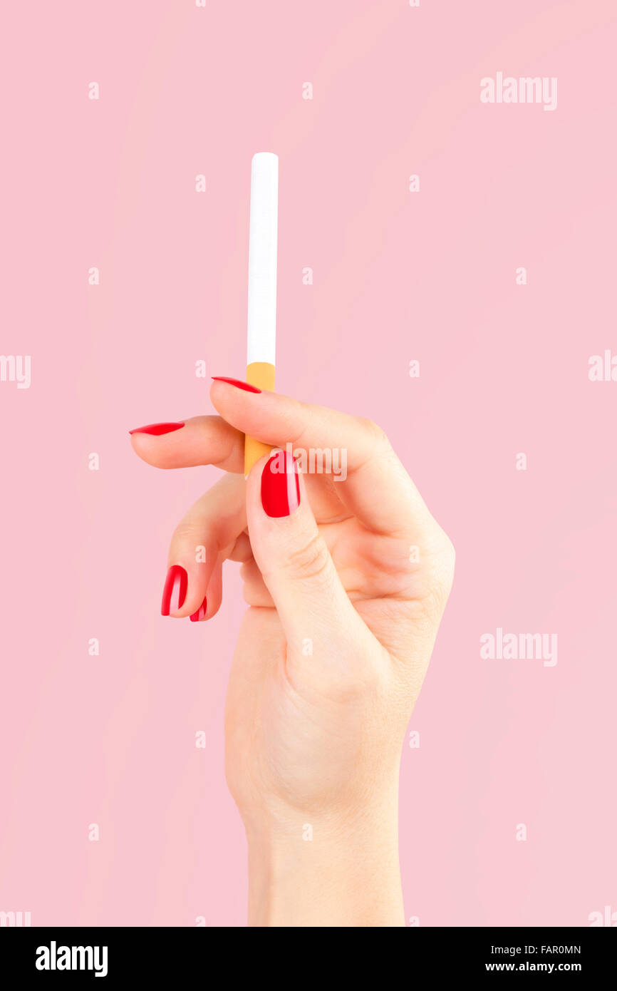 Red nails cigarette hi-res stock photography and images - Alamy