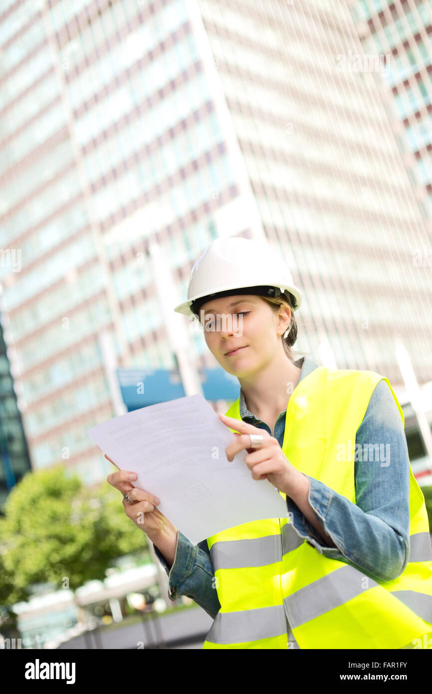 construction worker reading a letter Stock Photo - Alamy