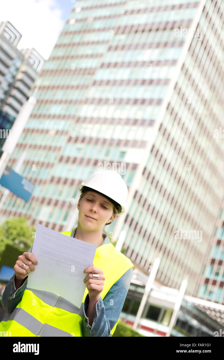 construction worker reading a document Stock Photo - Alamy