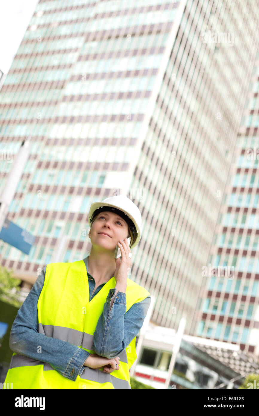 construction worker talking on the phone Stock Photo - Alamy