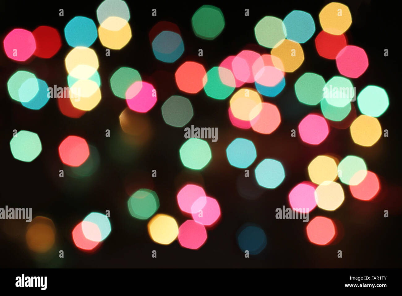 Blurred colored lights on black background Stock Photo - Alamy