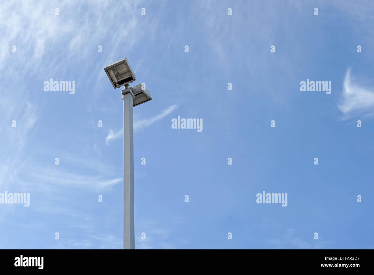 light post on beautiful sky background Stock Photo - Alamy