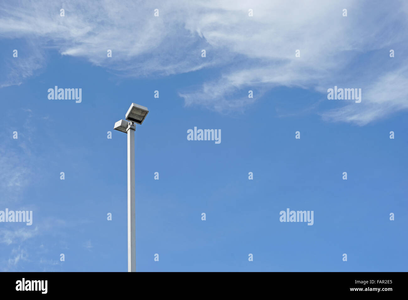 light post on beautiful sky background Stock Photo - Alamy