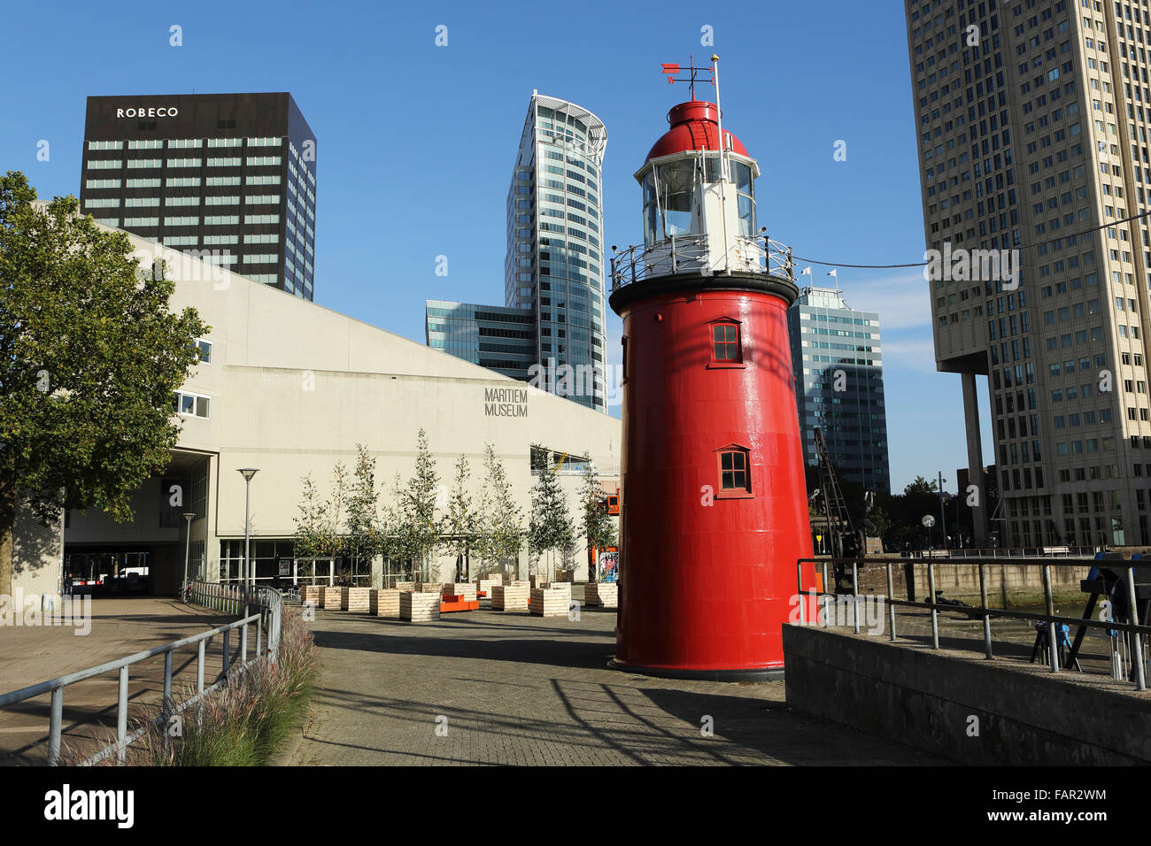 A red lighthouse stands outside of the Maritime Museum in Rotterdam ...