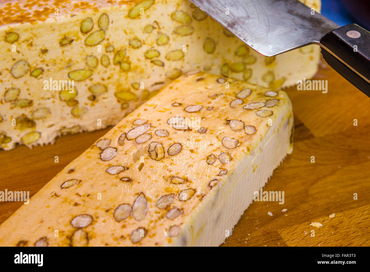 Nugget bars in outdoor public market, Provence, France Stock Photo - Alamy