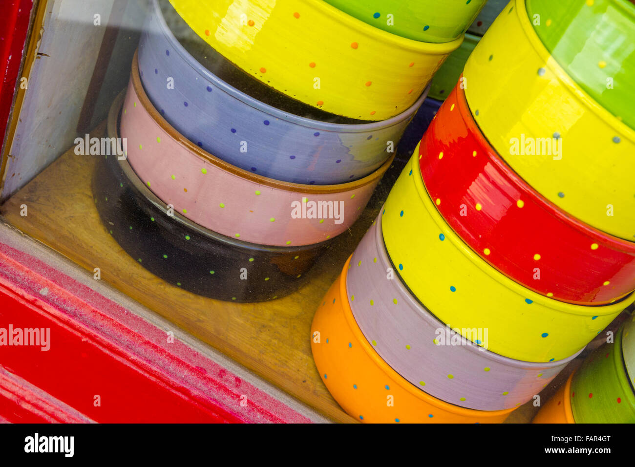 colored pots in shop window, Provence, France Stock Photo - Alamy