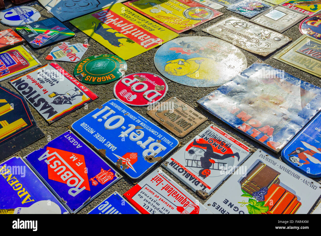 collectible metal signs in outdoor antique market, Provence, France ...