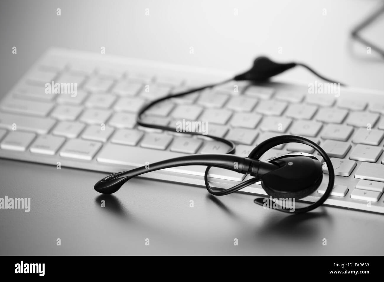 stock imagae of the reception head phone and key board Stock Photo - Alamy