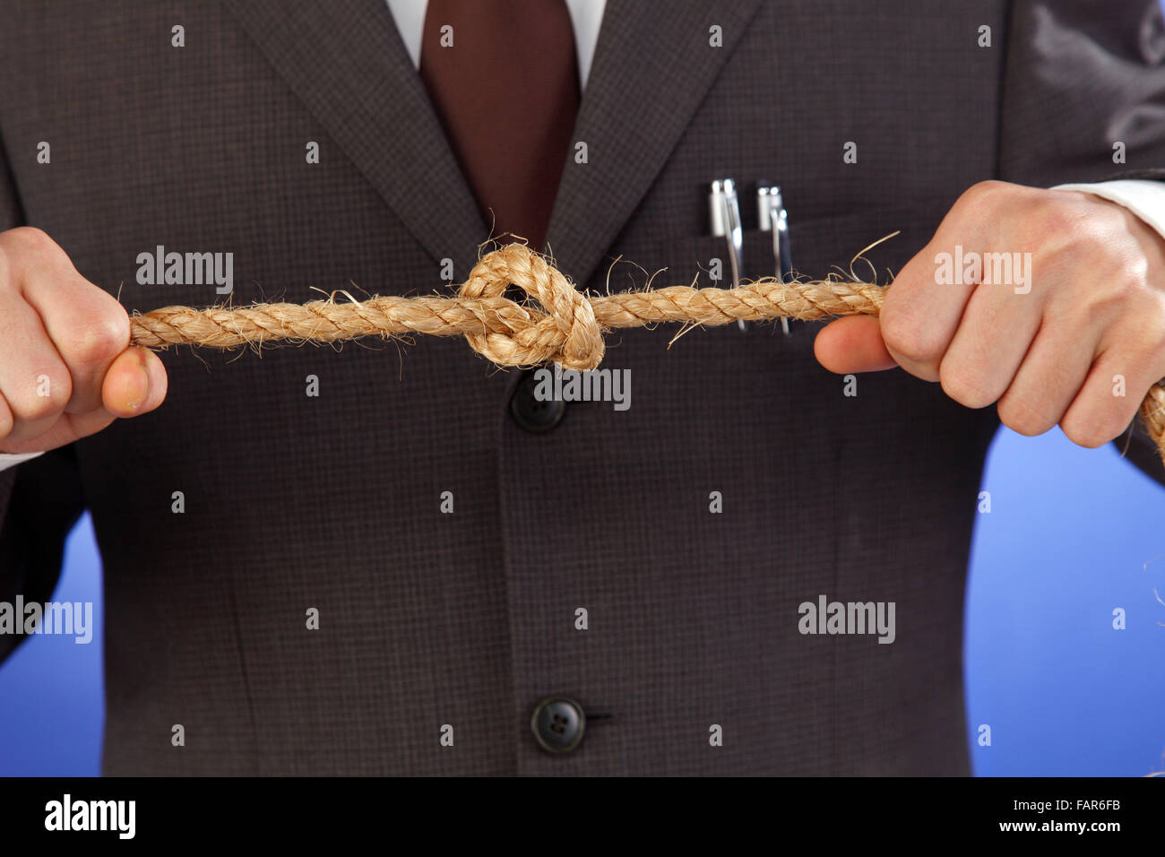 Person holding rope knot standing hi-res stock photography and images ...