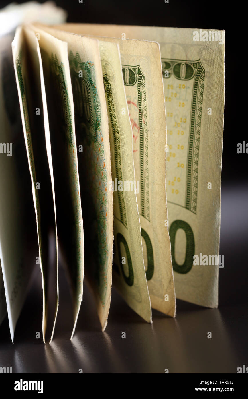 Stack of banknotes isolated on the black background Stock Photo - Alamy
