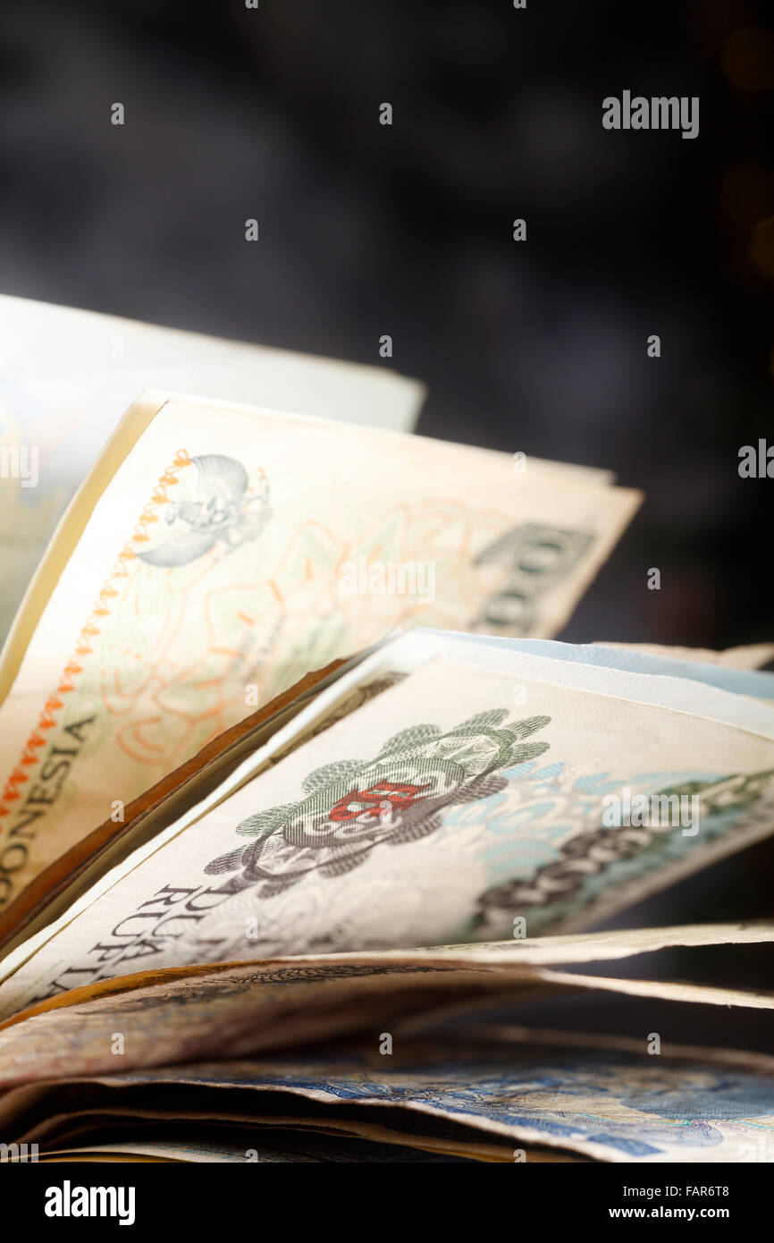 Stack of banknotes isolated on the black background Stock Photo - Alamy