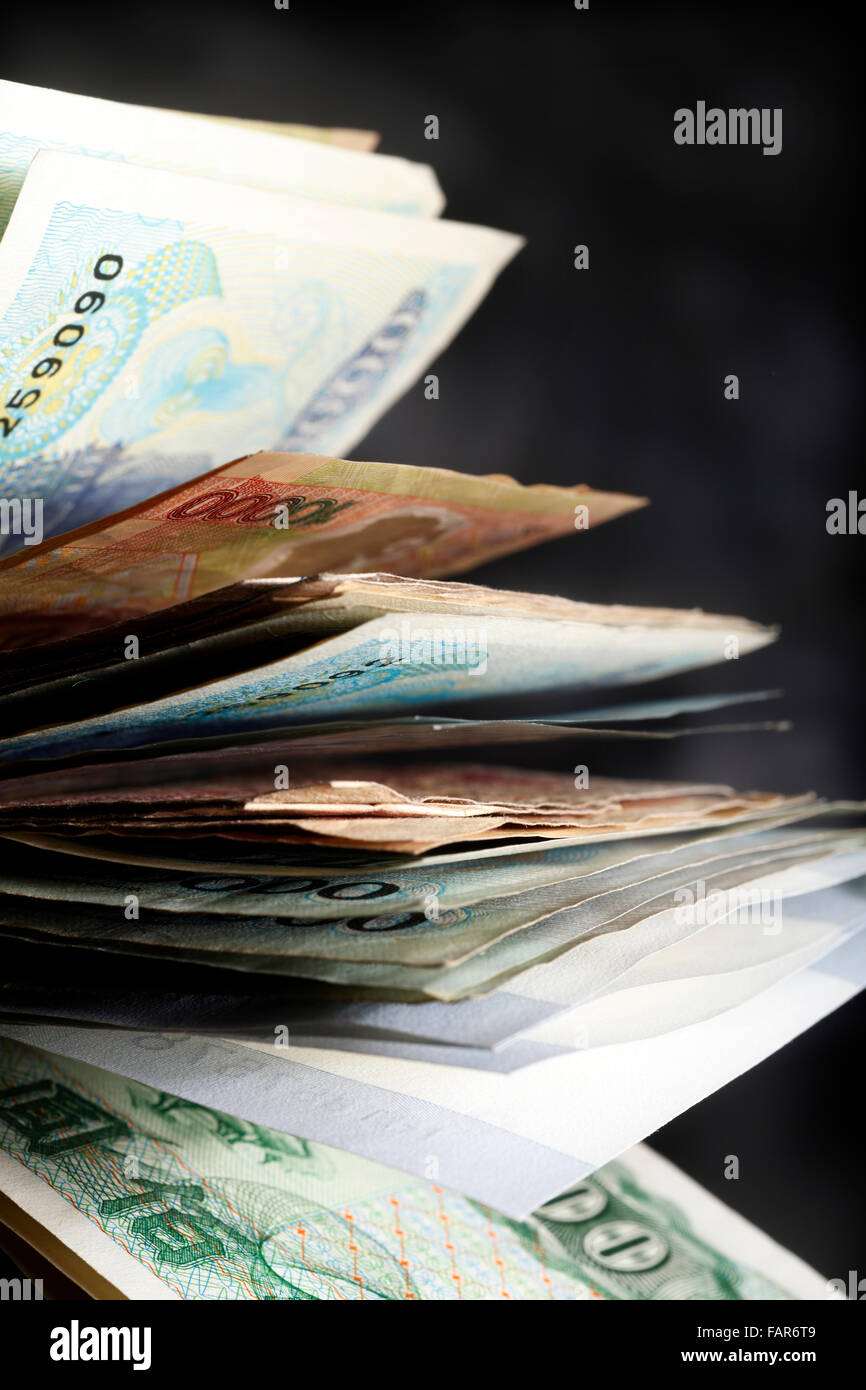 Stack of banknotes isolated on the black background Stock Photo - Alamy