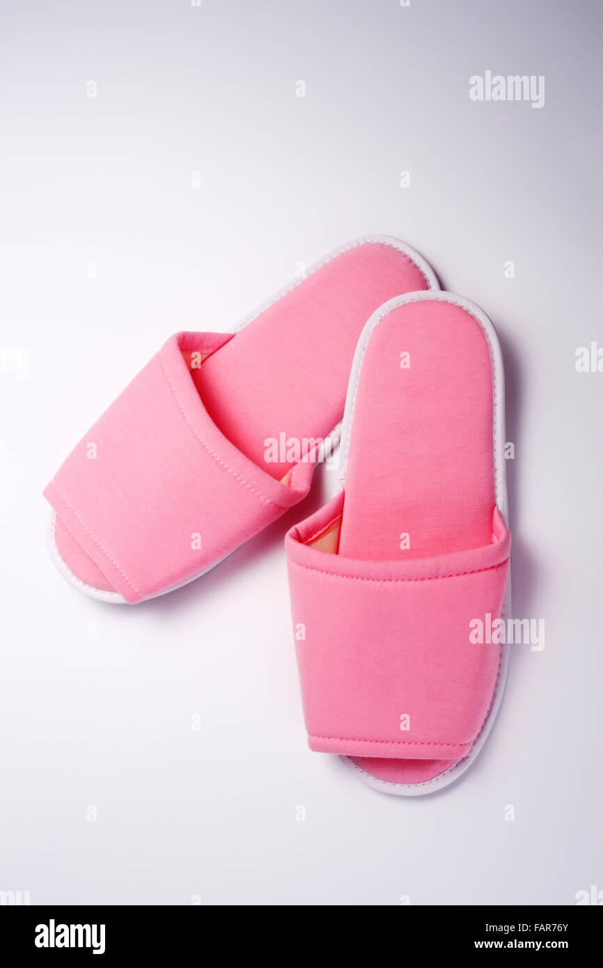 Pink slippers isolated on the white background Stock Photo - Alamy