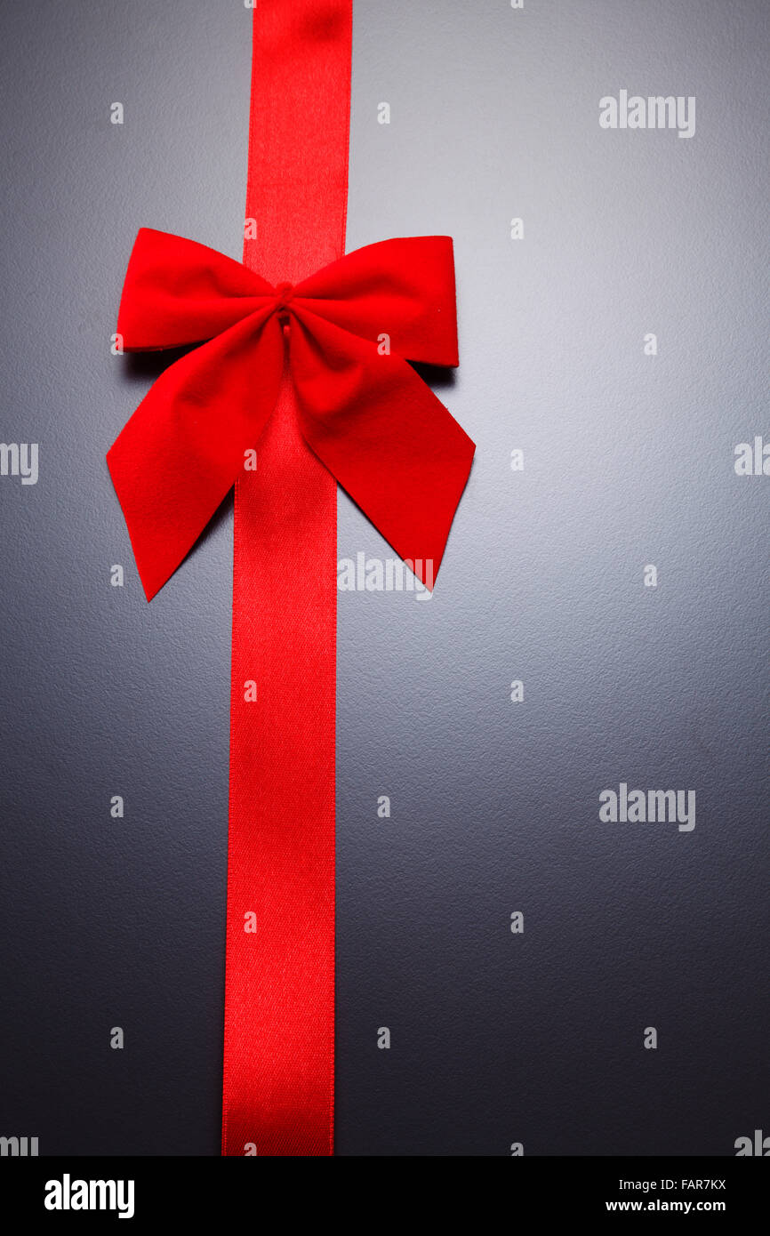 Red ribbon isolated on the black background Stock Photo - Alamy