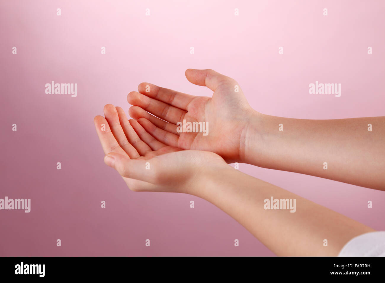 Human hand performing begging gesture Stock Photo - Alamy