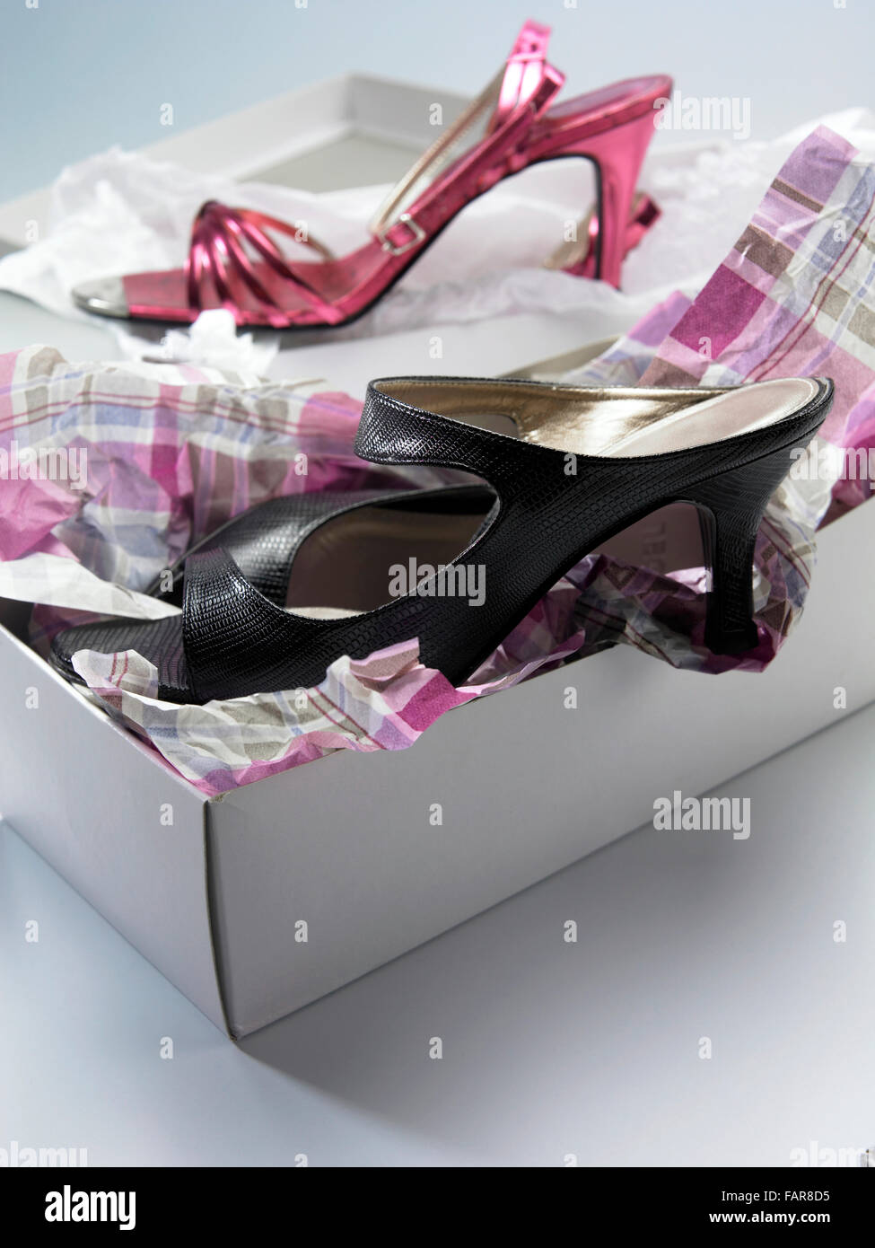 Two shoes beside each other Stock Photo - Alamy