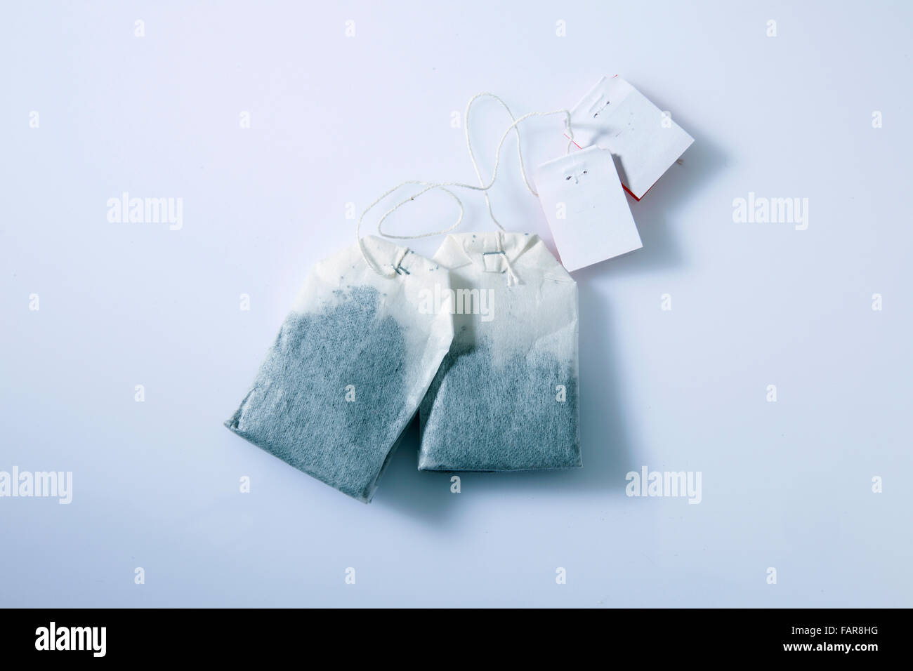 blue tone of the tea bag on the plain background Stock Photo - Alamy