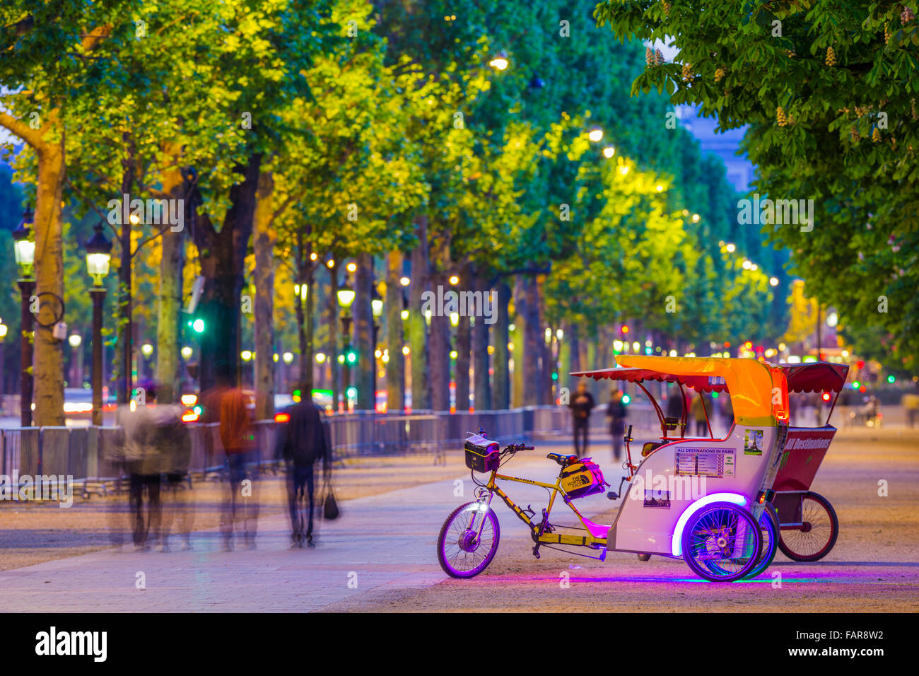 pedicab on the Champs-Élysées at night, Paris Stock Photo - Alamy