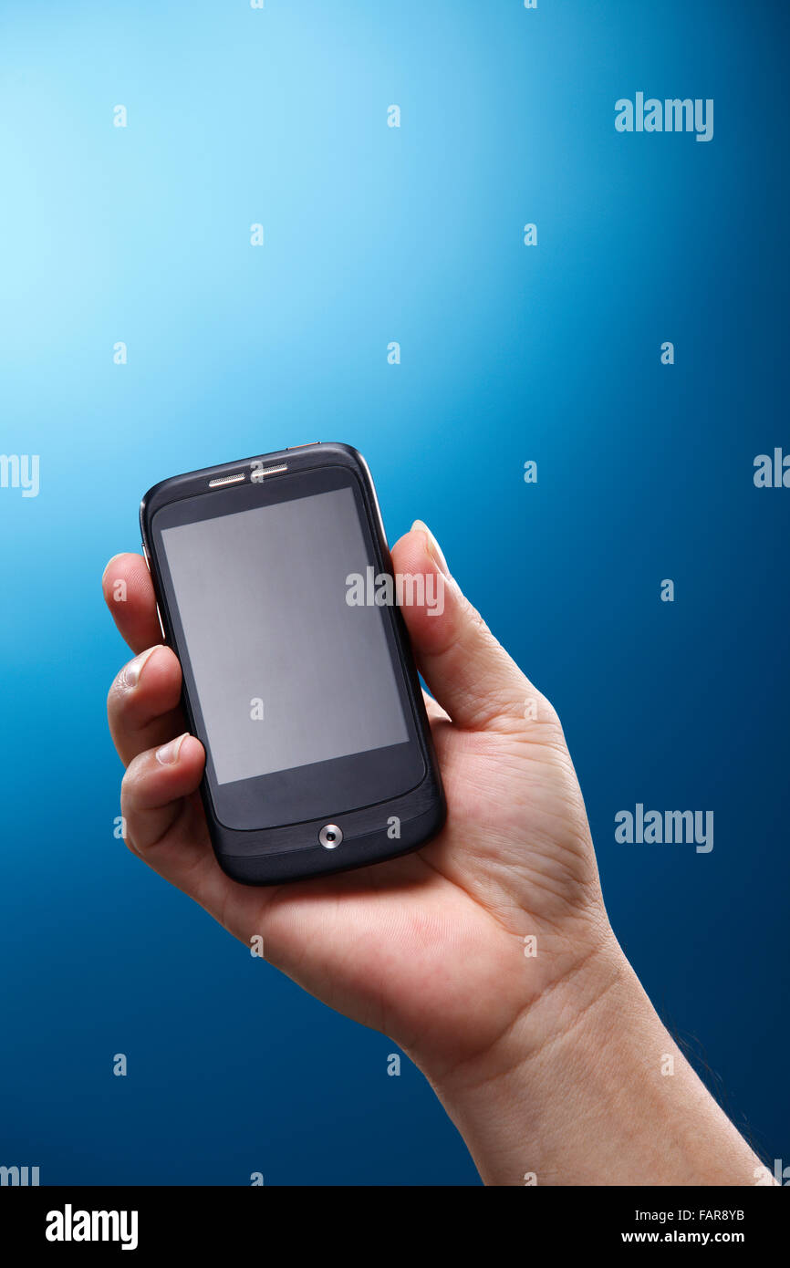 Human hand holding a smart phone Stock Photo - Alamy