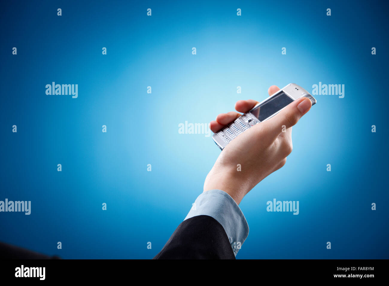 Human hand holding a cell phone Stock Photo - Alamy