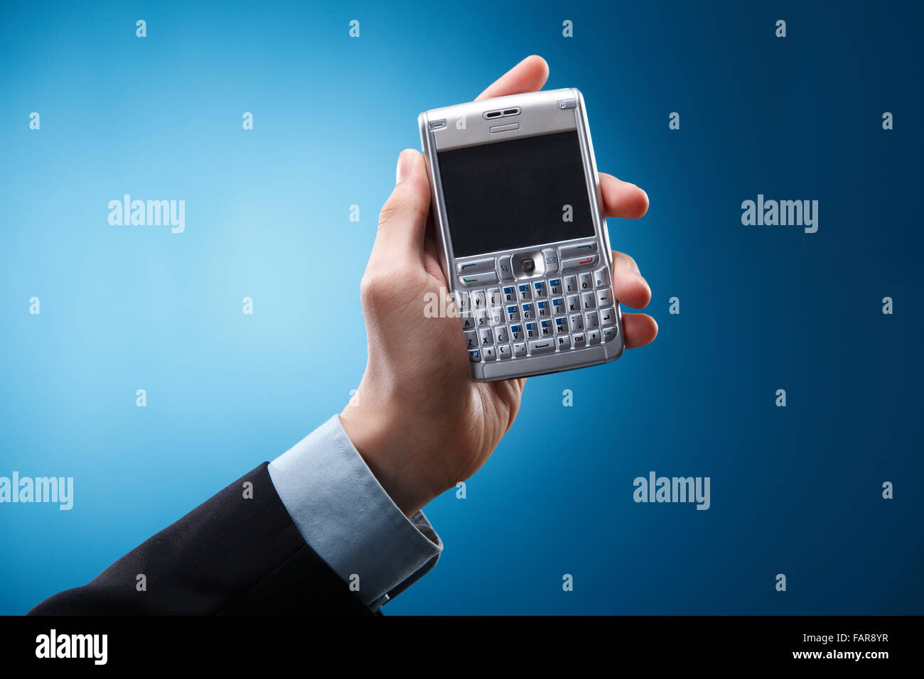 Human hand holding a cell phone Stock Photo - Alamy