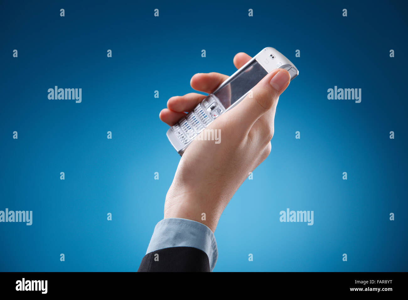 Human hand holding a cell phone Stock Photo - Alamy