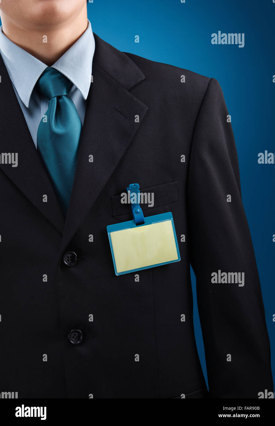 Person with name tag on chest Stock Photo - Alamy