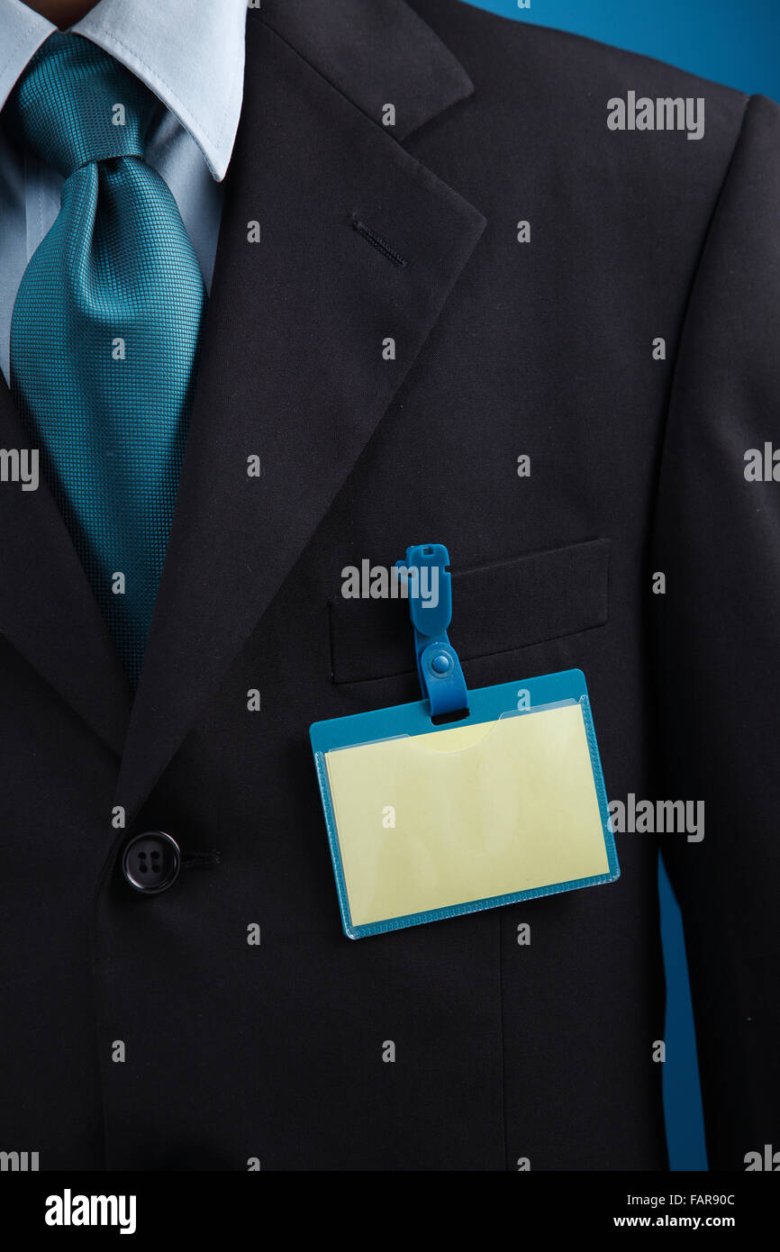 Person with name tag on chest Stock Photo - Alamy