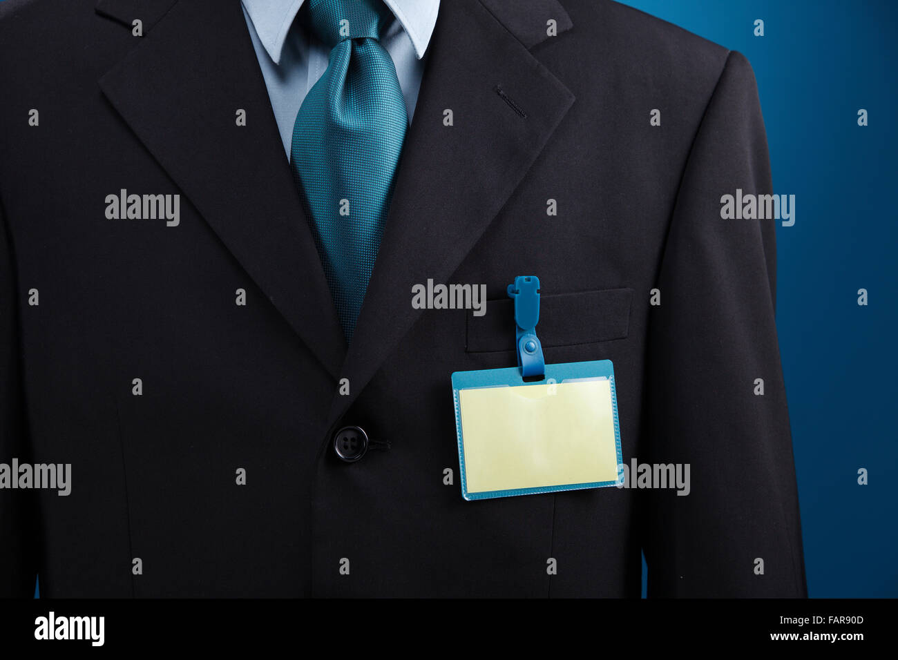 Person with name tag on chest Stock Photo - Alamy