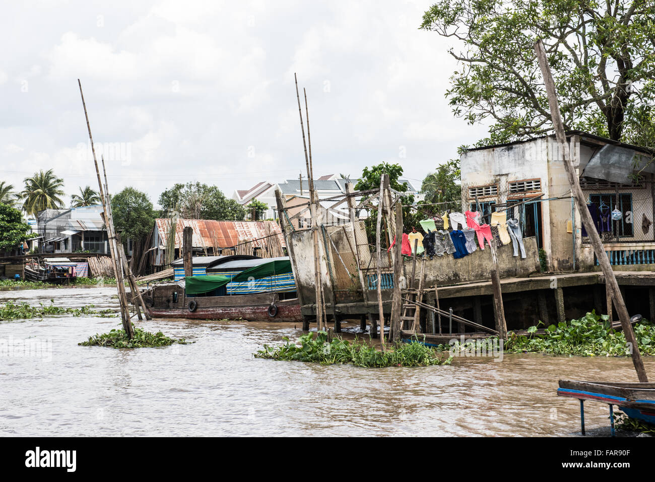 Residences on River Stock Photo - Alamy