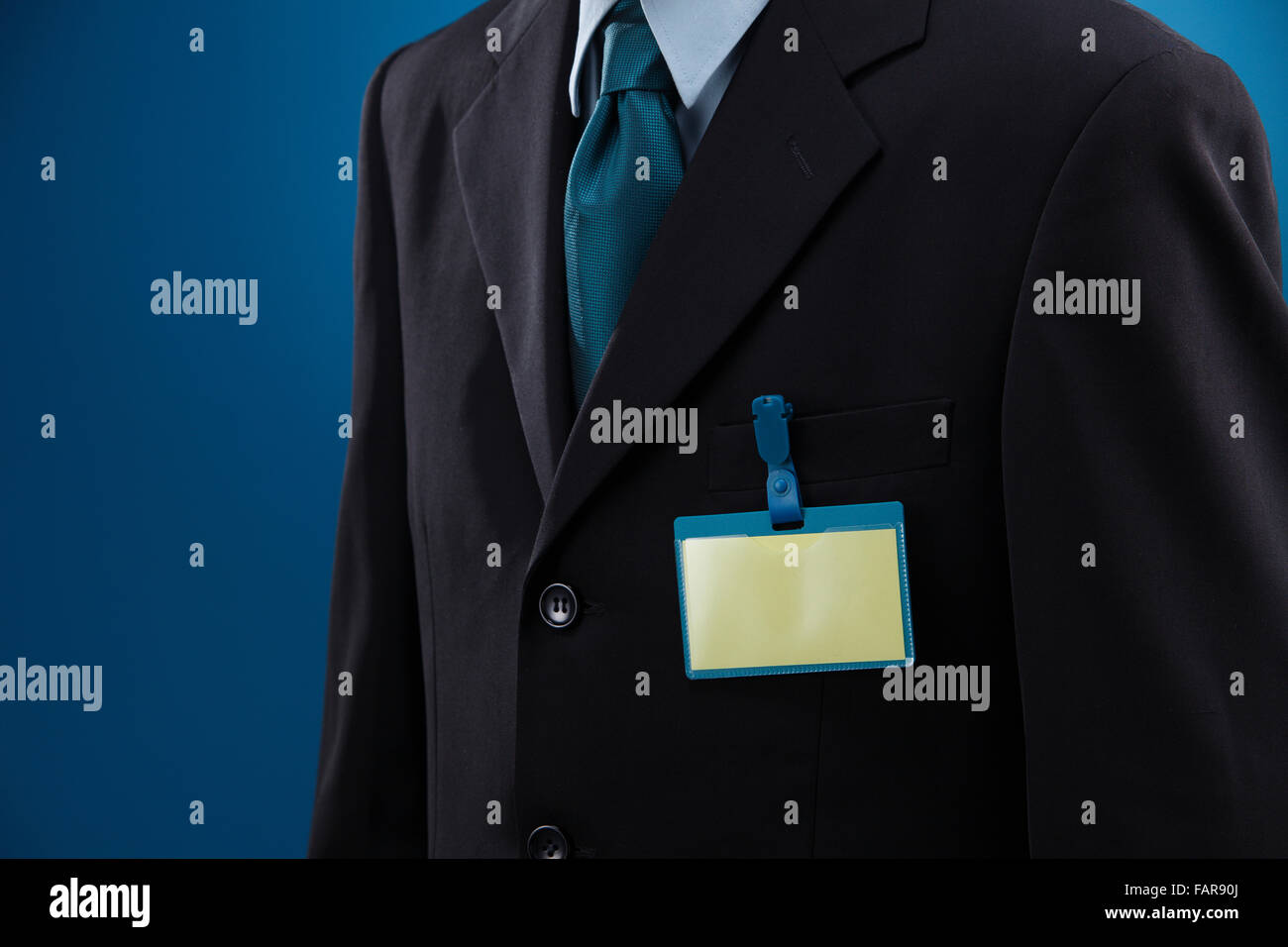 Person with name tag on chest Stock Photo - Alamy