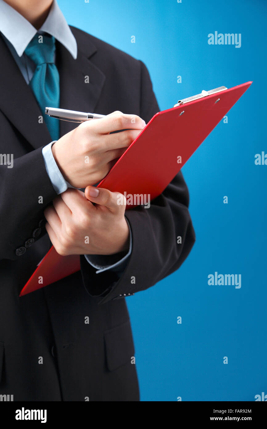 stock image of the man filling of form Stock Photo - Alamy