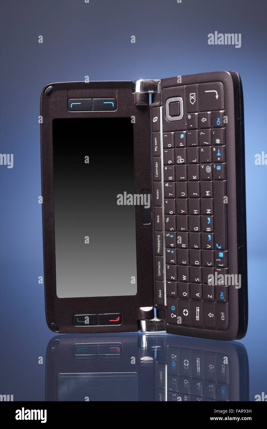 mobile phone on the blue background Stock Photo - Alamy