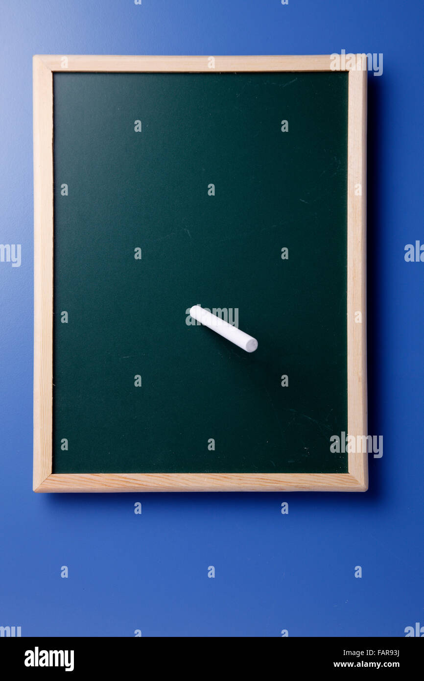 Blackboard with chalk on top of it Stock Photo - Alamy