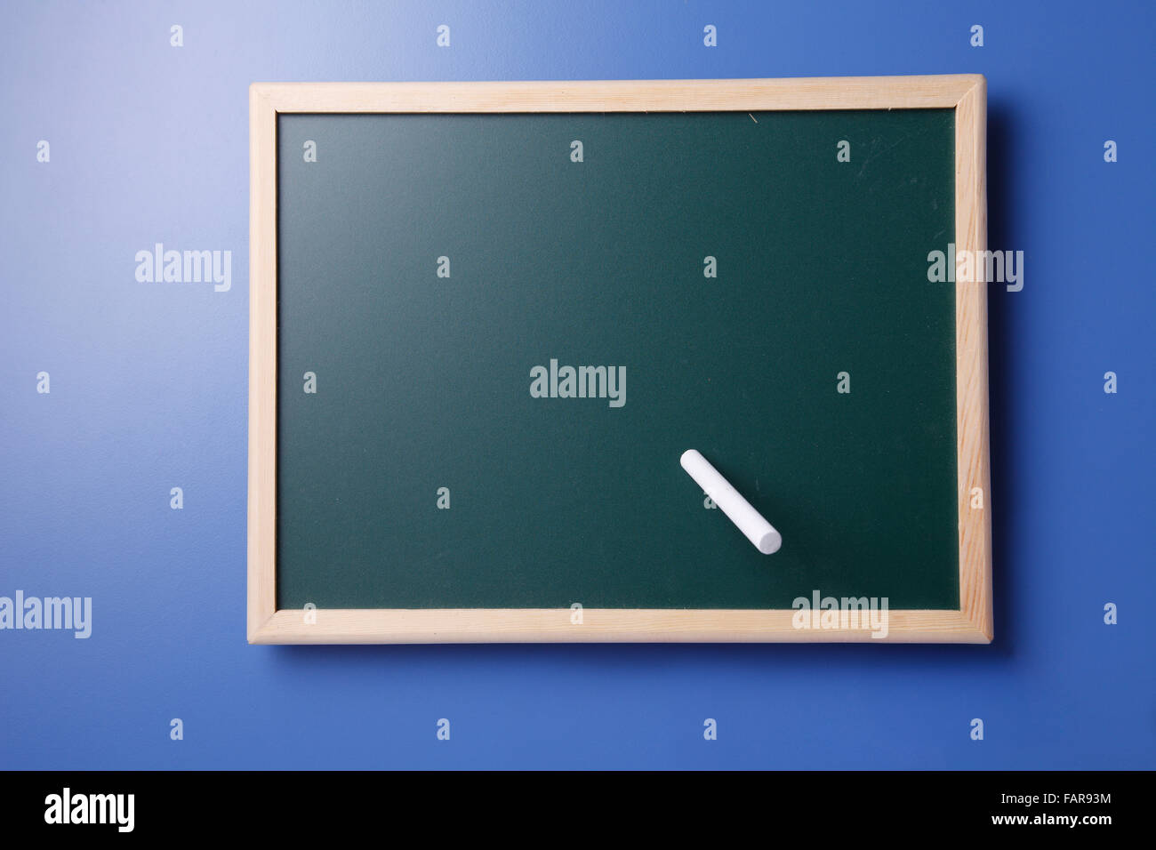 Blackboard with chalk on top of it Stock Photo - Alamy
