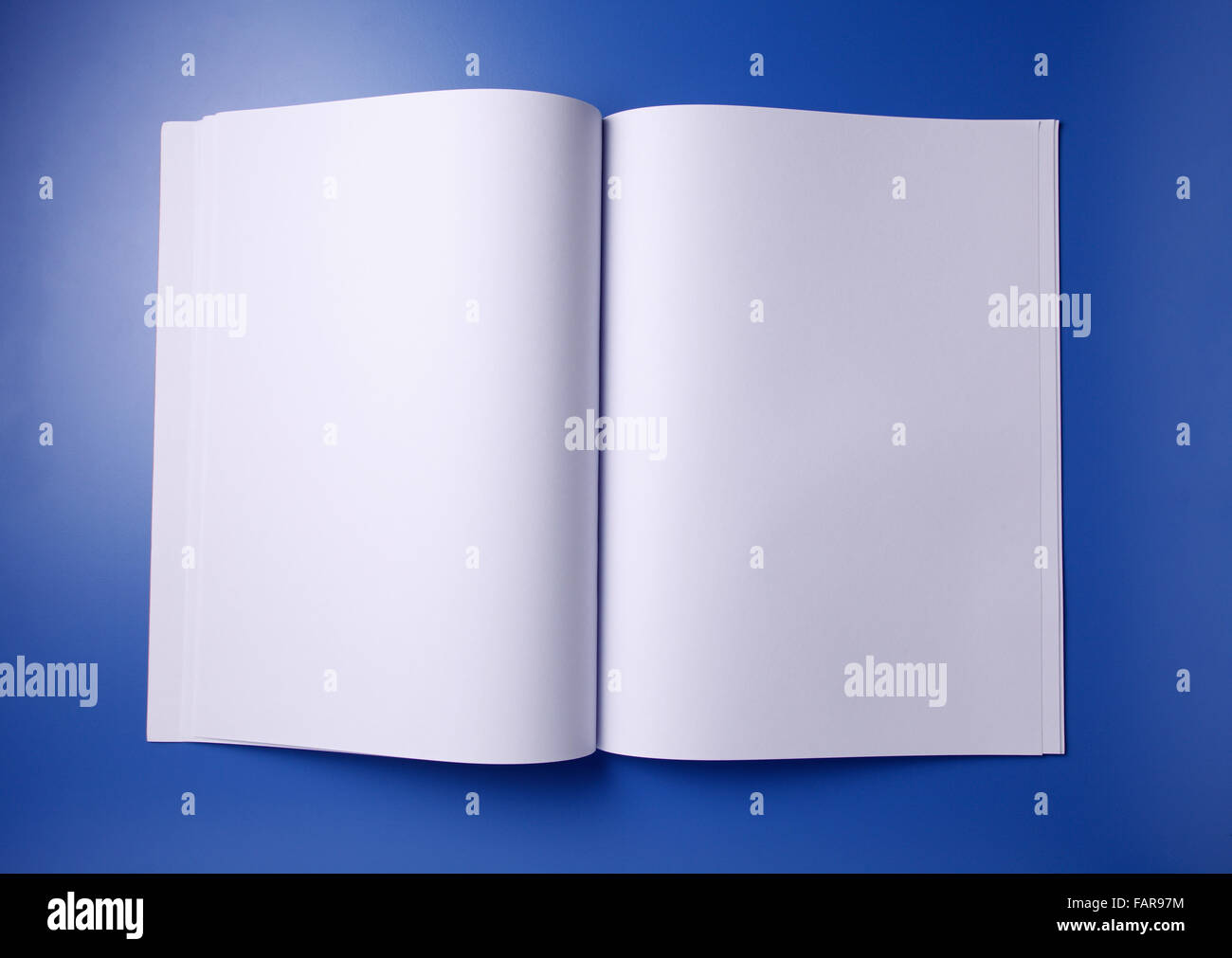 Drawing book isolated on the blue background Stock Photo - Alamy