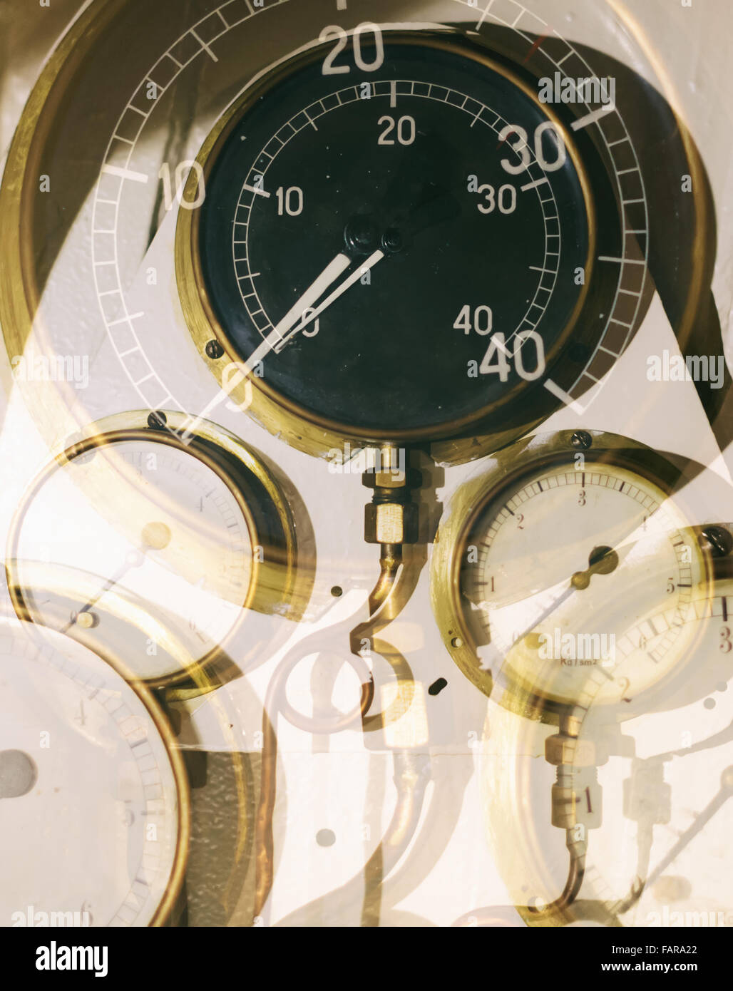 Abstract view of many metal manometers Stock Photo - Alamy