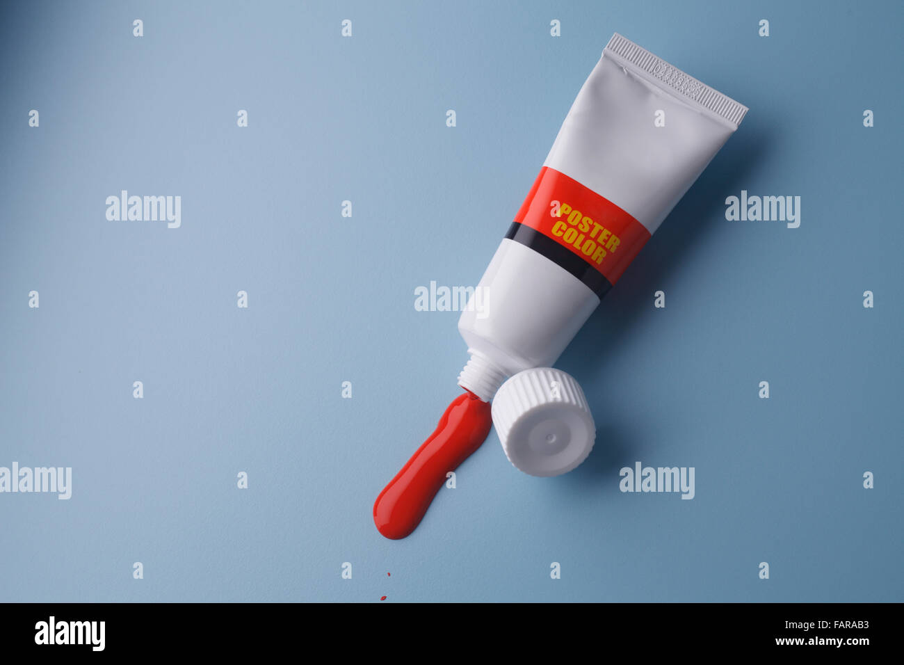 Tube of paint with some paint sqeezed out Stock Photo - Alamy