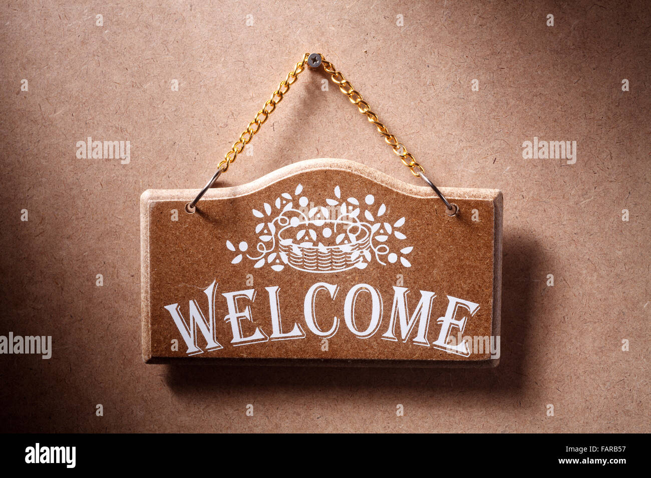 Welcome sign hung on background Stock Photo - Alamy