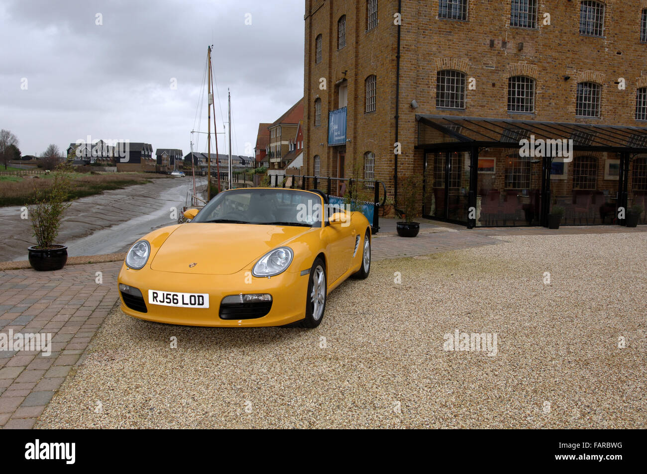 Yellow 2006 Porsche Boxster convertible sports car Stock Photo - Alamy
