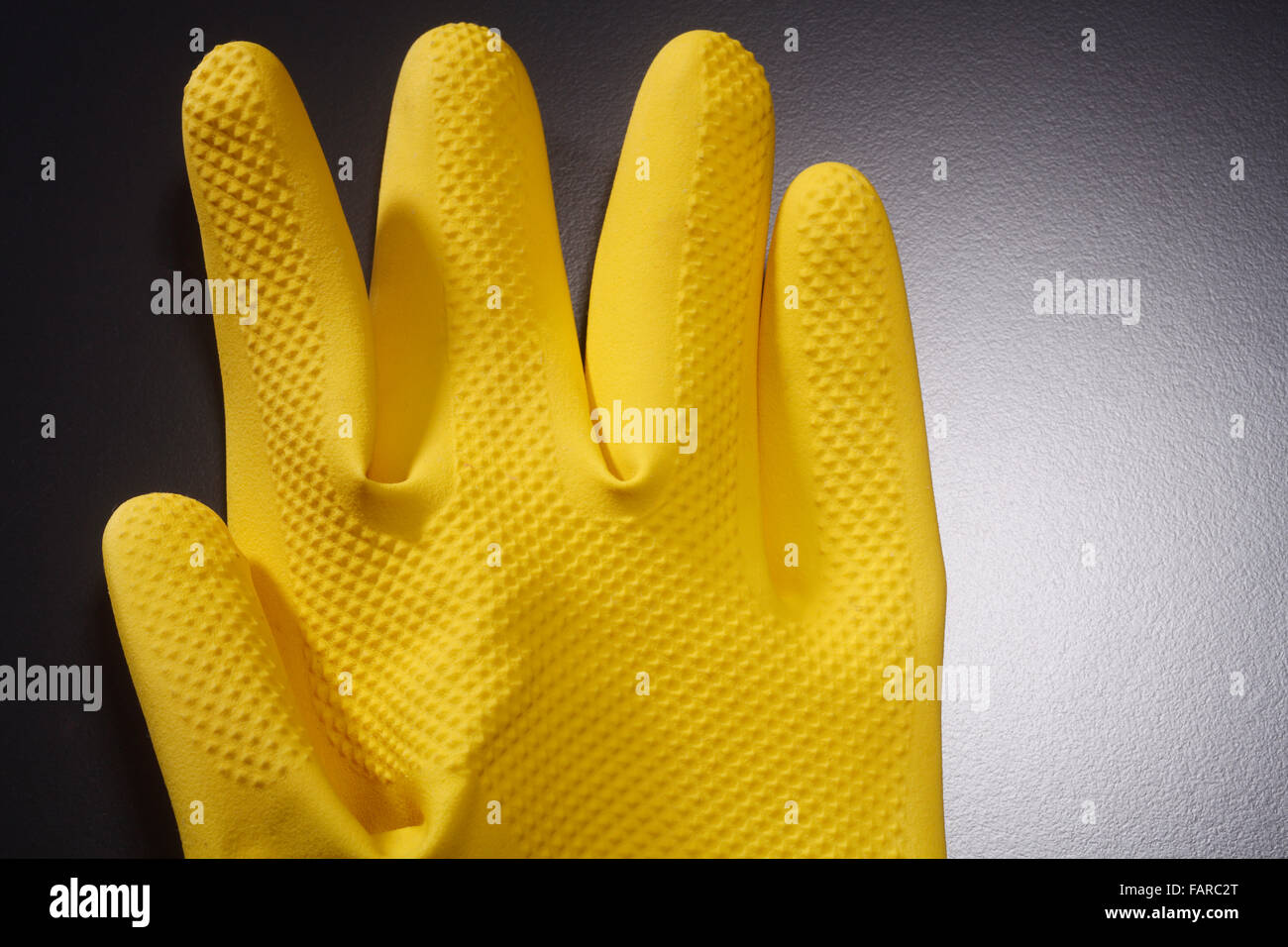 one rubber hand glove only Stock Photo - Alamy