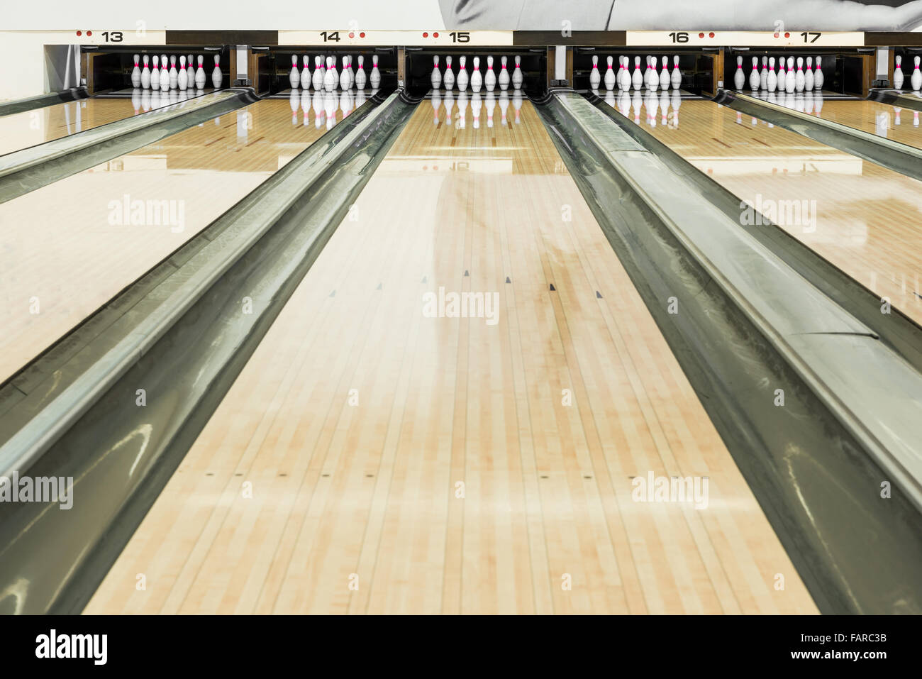 Close up of bowling pins in a row Stock Photo - Alamy
