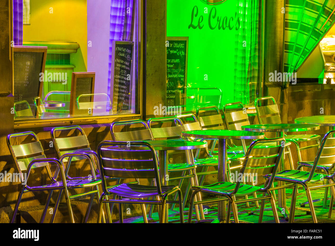 Outdoor cafe / bar at night in Colmar, France Stock Photo - Alamy