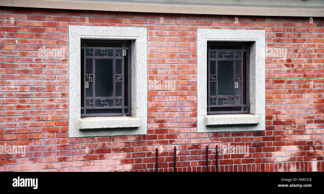 It's a photo of a window with a grid or bars to block the access Stock ...