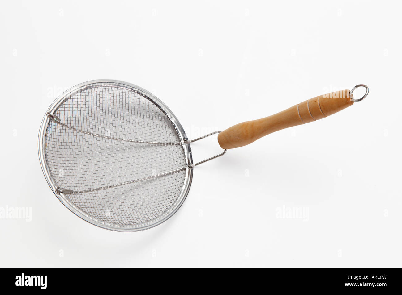 stainless steel sieve with woodenn handle Stock Photo - Alamy