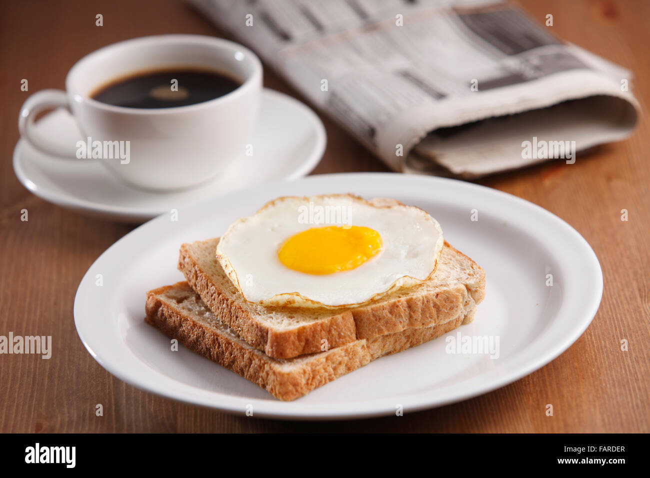 stock image of the breakfast and newspaper Stock Photo - Alamy