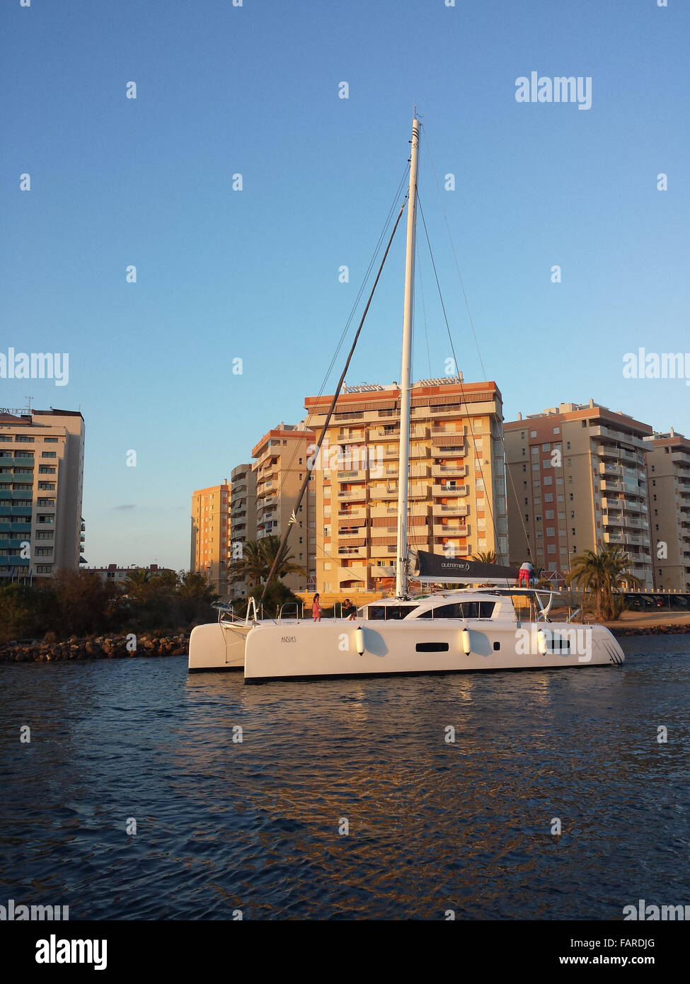 catamaran sailing at sunset Stock Photo - Alamy