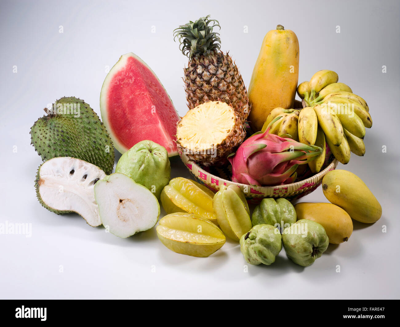 Collection of a ripe tropical fruits isolated over plain background ...