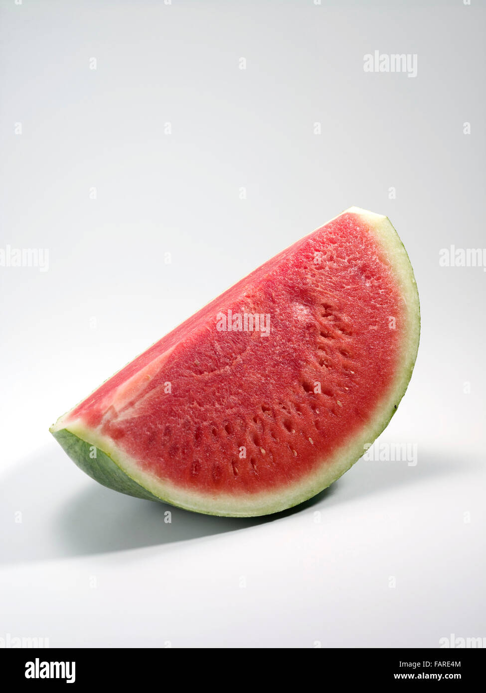 Ripe watermelon on plain background Stock Photo - Alamy